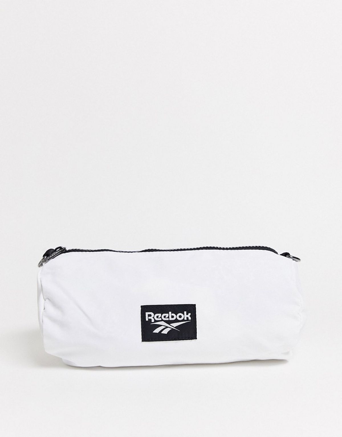 Reebok Vector Cross Body Bag In White | WHAT’S ON THE STAR?