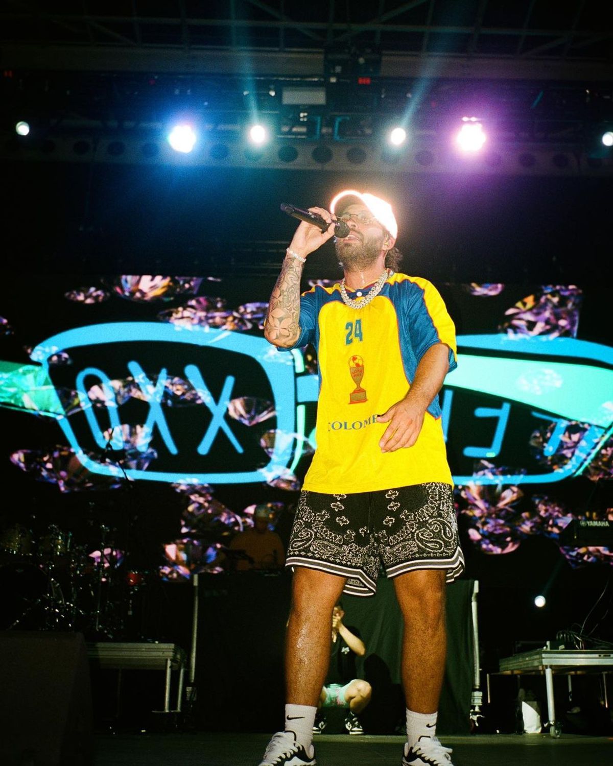 Feid Outfit from December 24, 2021 | WHAT’S ON THE STAR?