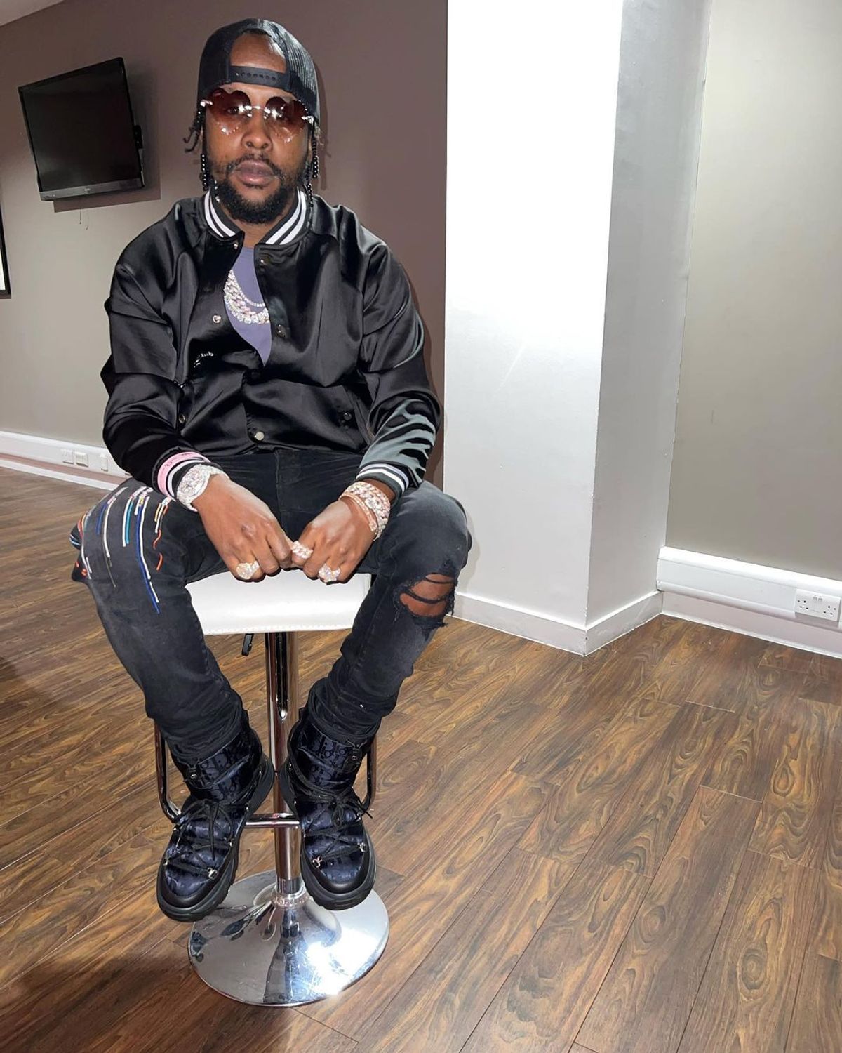 Popcaan Outfit from March 2, 2022 | WHAT’S ON THE STAR?