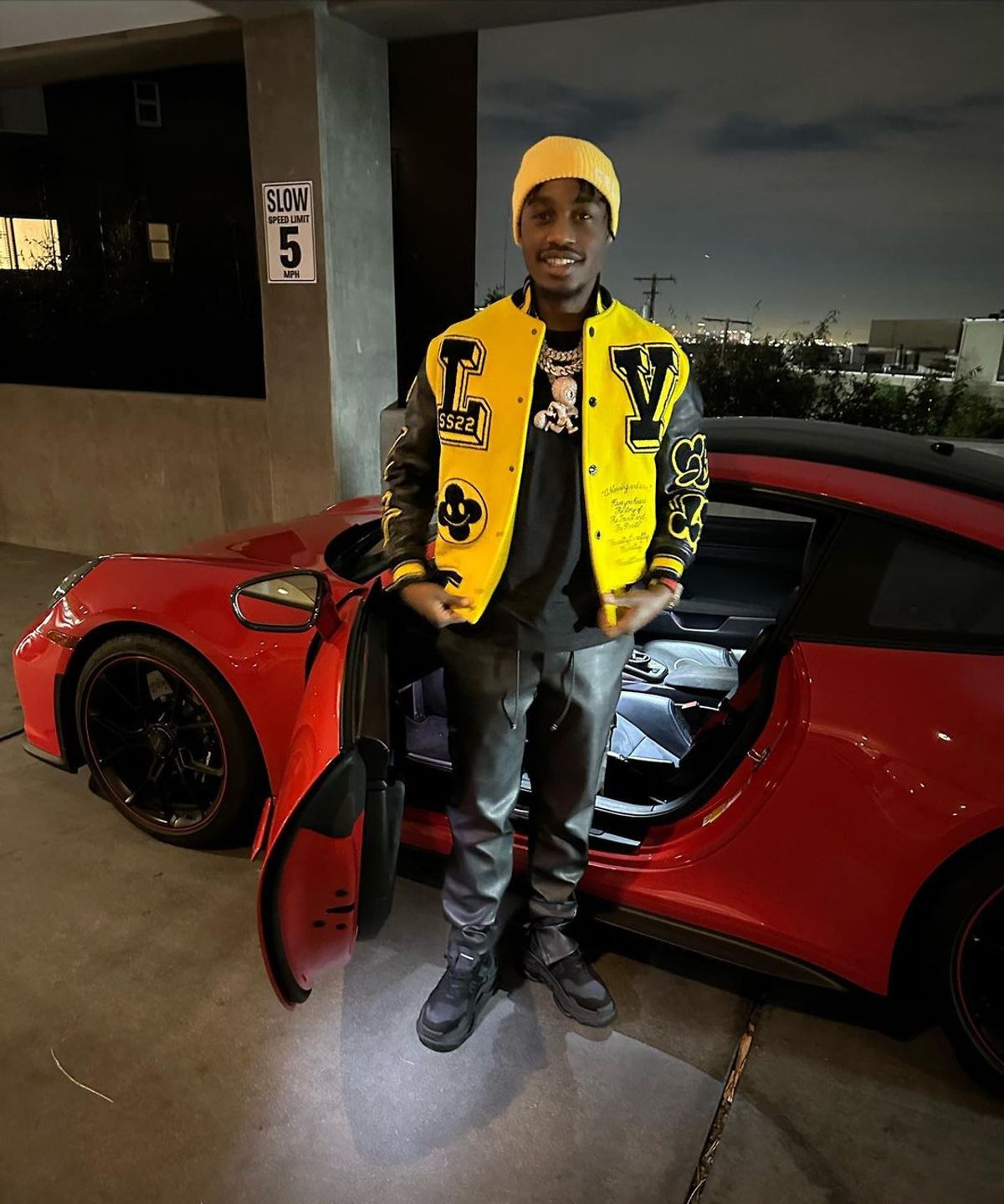 Lil Tjay Outfit from February 10, 2023 | WHAT’S ON THE STAR?