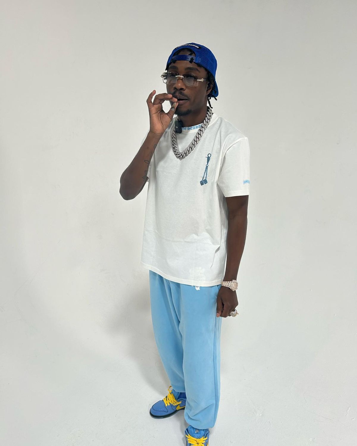 Lil Tjay Outfit from January 9, 2024 | WHAT’S ON THE STAR?