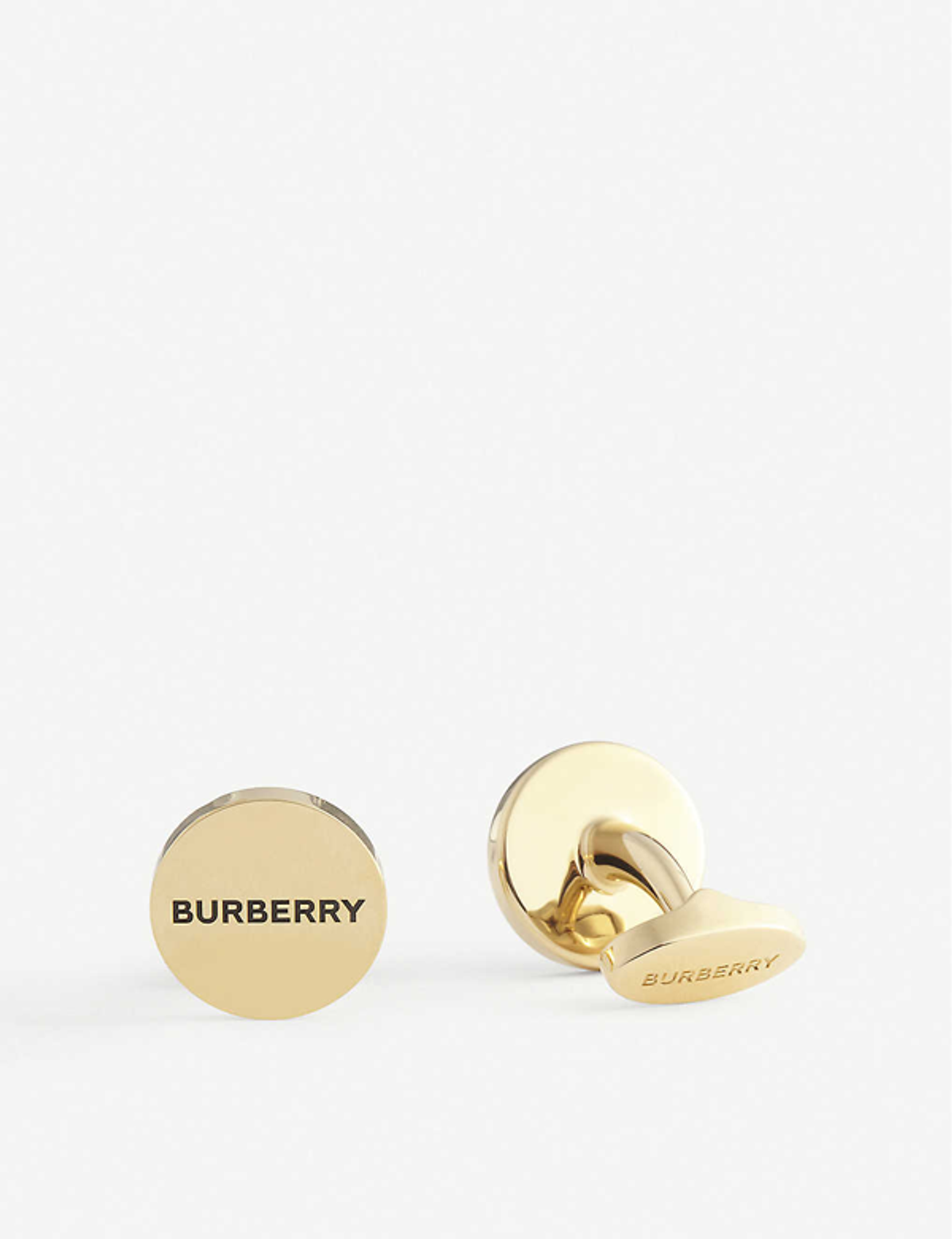 Burberry Logo Engraved Brass Cuff Links In Gold | WHAT’S ON THE STAR?
